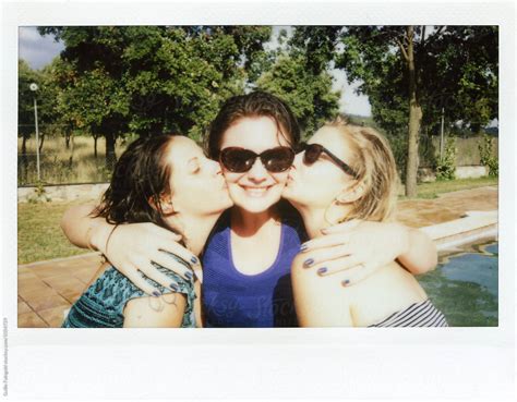 Girlfriends Kissing Their Best Friend By Stocksy Contributor Guille