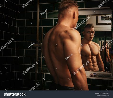 Muscular Naked Man Looking Himself Mirror Stock Photo Shutterstock