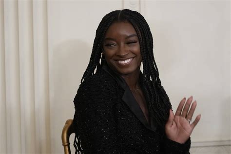 Simone Biles Flaunts Her 325000 Ring In Black Slit Dress For Best