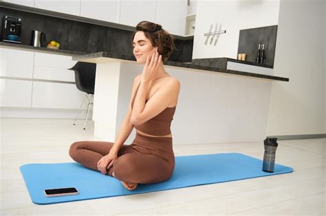 Free Photo Mindfulness And Healthy Lifestyle Young Smiling Woman Sits