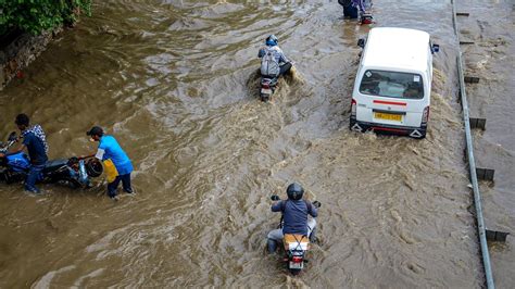 In Photos Heavy Rainfall Causes Severe Waterlogging In Gurugram