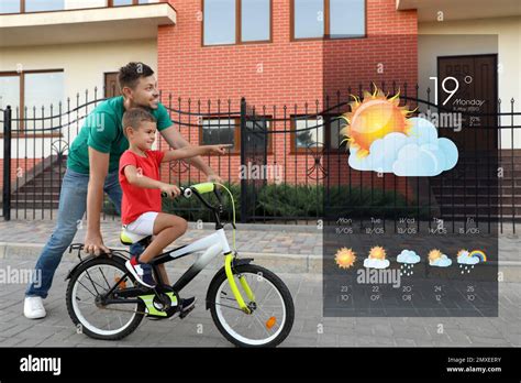 Happy Father Teaching His Son To Ride Bicycle And Weather Forecast Widget Mobile Application