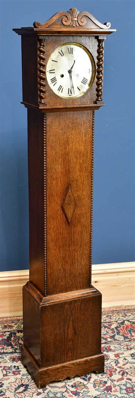 Lot 2313 An Early 20th Century Oak Cased Longcase