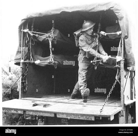 New Method Of Getting Casualties Over The River A Lorry Stands By
