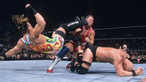 Download Rob Van Dam Kicking Kurt Angle Wallpaper