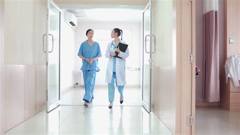 Professional Team Multiethnic Medical Group Asian Female Doctor And
