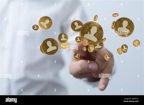 Hand Pointing At 3d Digital Rendering Of Icons Of People Connecting