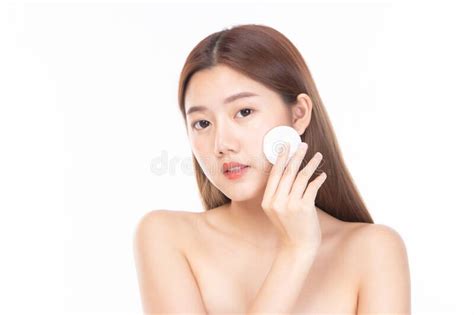 Attractive Beauty Young Asian Woman Clean Skin With Cotton Pad Removing