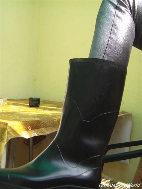Cute Rebecca In Black Rubber Boots