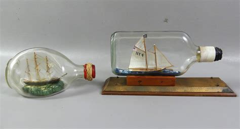 At Auction 2 Old Ships In A Bottle