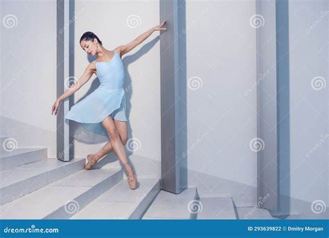 Graceful Slim Professional Caucasian Ballet Dancer In Blue Tutu Dreass