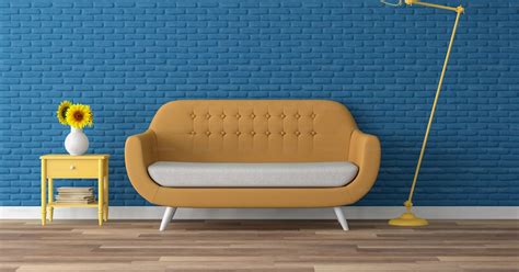 다채로운 거실 3d 렌더링 나무 바닥 네이비 블루 빈 벽돌 벽 노란색 패브릭 소파로 장식 사진 Unsplash의 벽돌 벽 이미지