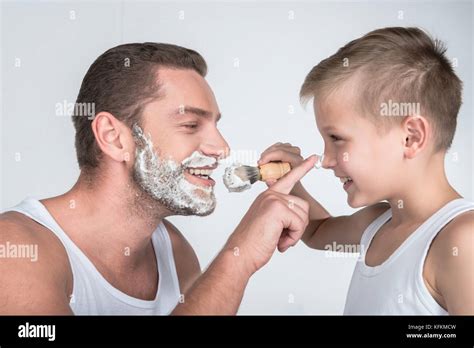 Father And Son Shaving Together Stock Photo Alamy