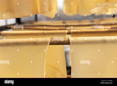 Rubber Sheets Hanging On Rail For Dry Process Air Dried Sheet Ads