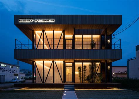 Tree Grows Through Voids In Hamada Designs Glass Wood Building