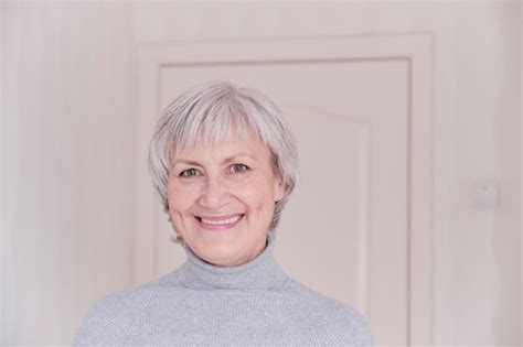 Premium Photo Close Up Portrait Of Smiling And Looking At Camera