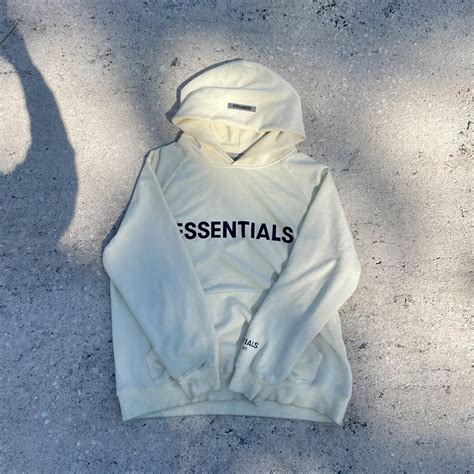 Essentials Cream And Black Hoodie Size Depop