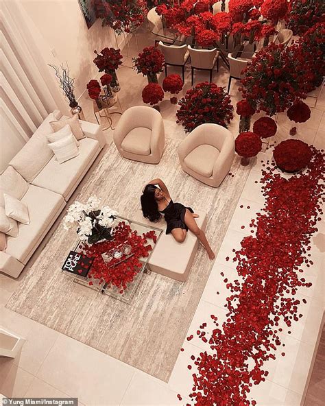 Yung Miami Shows Off Living Room Filled With Red Rose Bouquets From