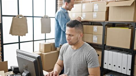 Two Men Ecommerce Business Workers Using Computer Working At Office