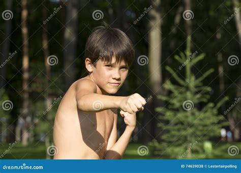 Portrait Of A Boy In Nature Stock Photo Image Of Muscular Background