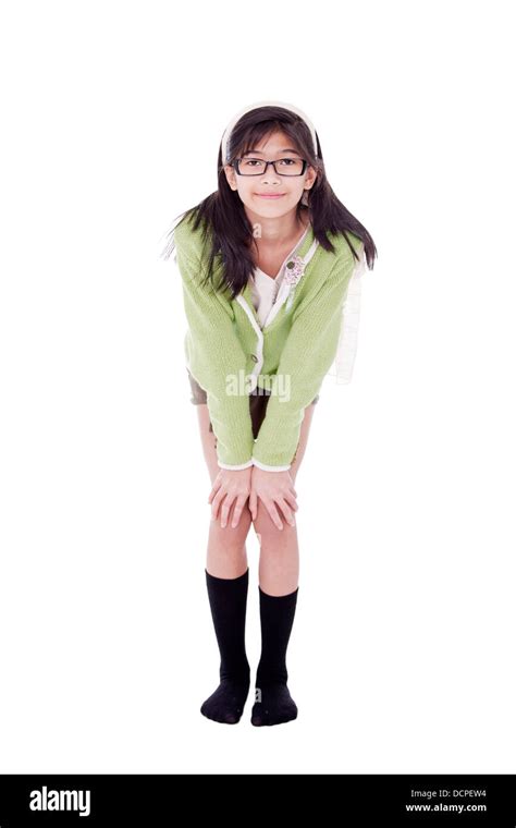 Girl In Green Sweater And Glasses Bending Forward Hand On Knees Stock