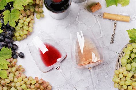 Premium Photo White Rose And Red Wine Bottles And Glasses