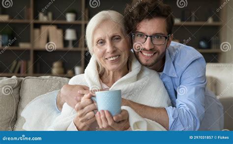 Close Up Portraits Loving Son Cuddling Mature Pensioner Mother Stock