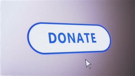 donate button pressed on computer screen by cursor pointer mouse