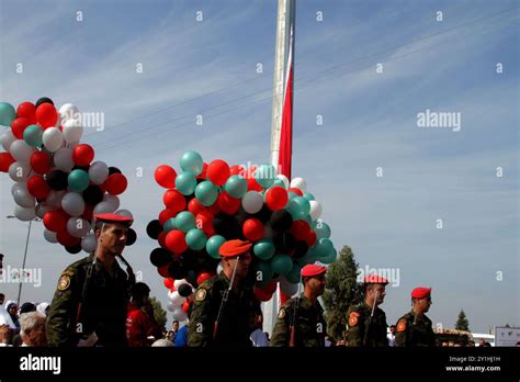 Palestinian Security Personnel Take Part In A Rally To Raise A