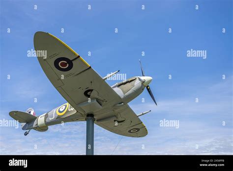 A Replica Spitfire Fighter Aircraft From WW2 Pictured On The Edge Of