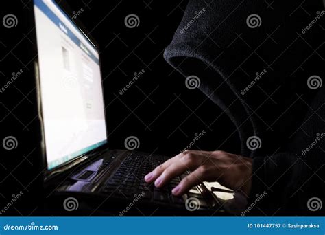 Hacker Man In Black Using Computer Laptop For Criminal Activity Hacking