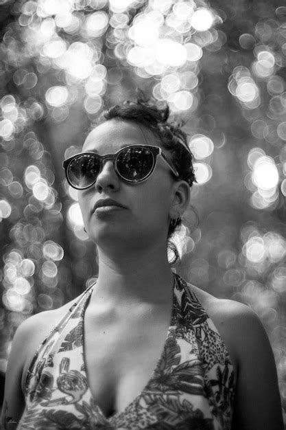 Premium Photo Portrait Of Woman Wearing Sunglasses
