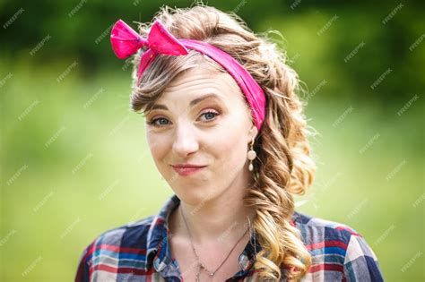 Premium Photo Beautiful Young Girl In A Plaid Shirt And Short Denim