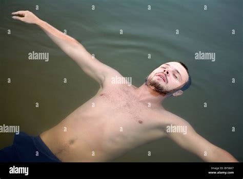 Man Floating On Water Stock Photo Alamy