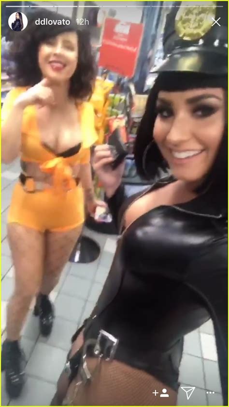Demi Lovato Shows Her Figure In Police Officer Halloween Costume