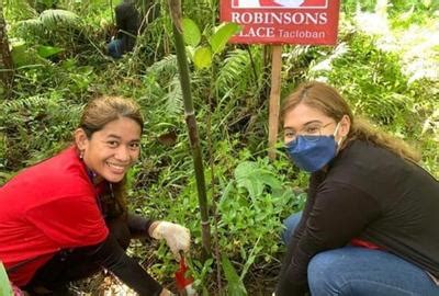 RLove Joins CENRO Taclobans Tree Planting Initiative Robinsons Land