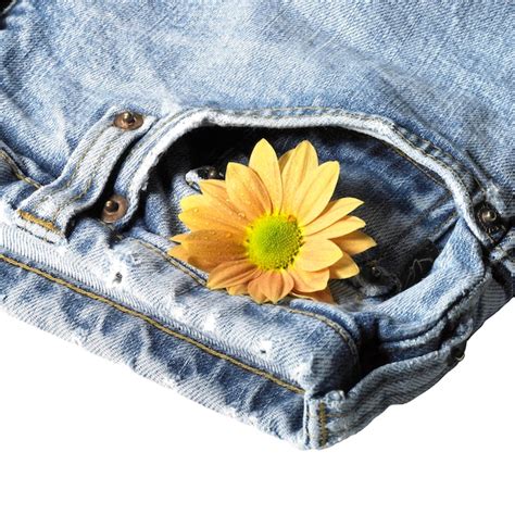Premium Photo Pair Of Blue Jeans And Flower