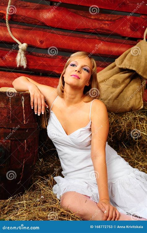 Blonde Girl In A White Dress In The Hayloft Stock Image Image Of