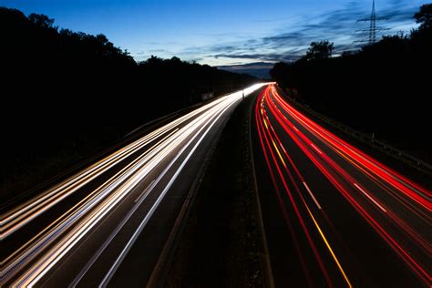 Time Lapse Photography Of Vehicles Passing By High Way Road Photo