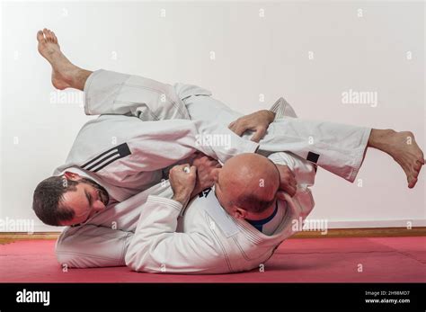 Brazilian Jiu Jitsu Training Demonstration In Traditional Kimono Bjj