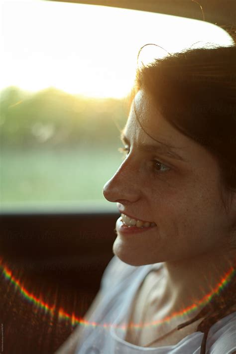 Young Happy Woman With Freckles In A Car By Stocksy Contributor