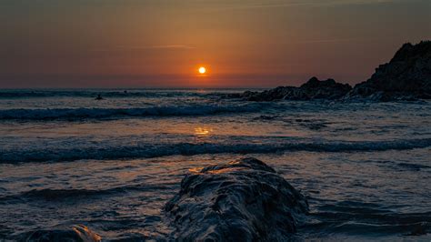 Download Wallpaper 3840x2160 Sea Sunset Landscape Stones Waves