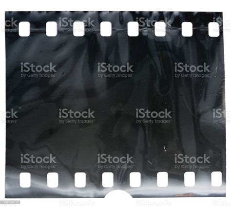 흰색 배경에 호일에 실제 및 원래 35mm 또는 135 필름 재료 또는 사진 프레임 먼지와 35mm 필름 스트립 0명에 대한