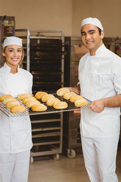 Two Bakers Holding Tray With Sandwiches In Bakery Stock Image Image