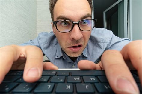 Premium Photo Funny And Crazy Man Using A Computer On White