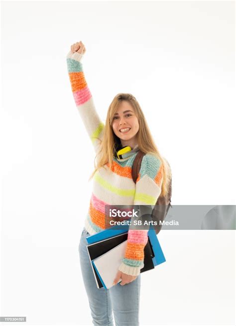 Beautiful Millennial Teenager Girl With Backpack And Folder Smiling And