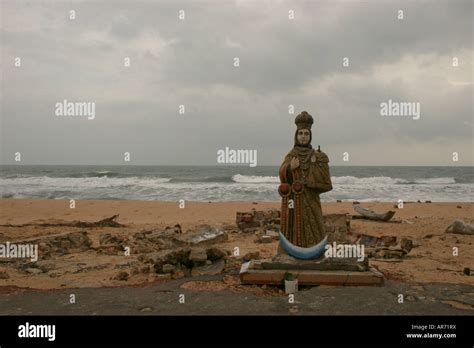 Religious Statue Of A Saint Placed On The Beach After The Tsunami