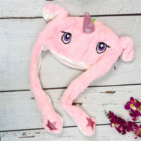 قیمت و خرید کلاه بچگانه مدل گوش متحرک پمپی چراغدار طرح یونیکورن