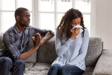 Frustrated African American Man Apologizing To Woman After Quarr Stock