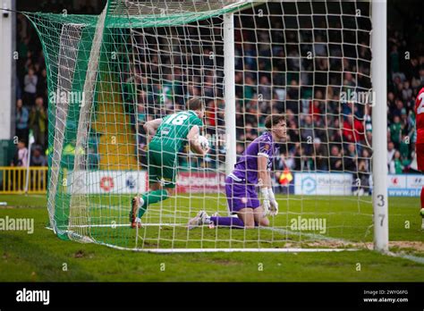 Alex Fisher Of Yeovil Town Heads Ball Past Oliver Wright Of Worthing